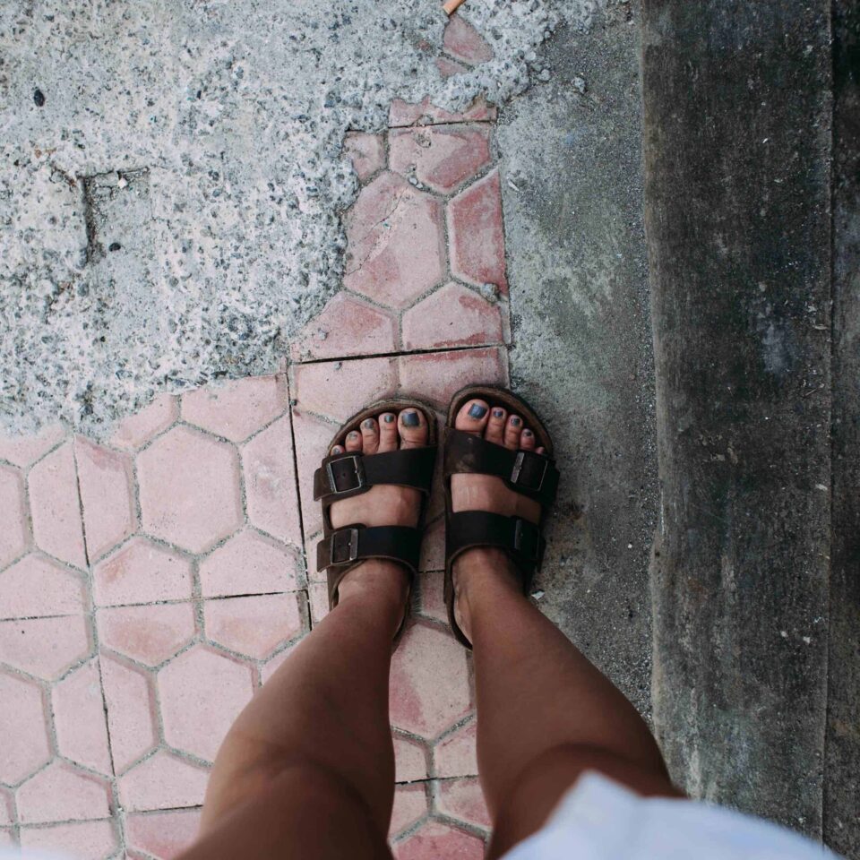 11 Tips And Tricks On How To Keep Slides On Your Feet